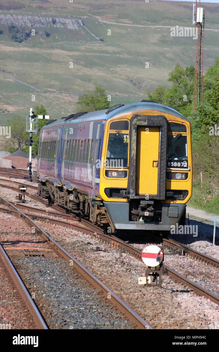 Class 158 Express Sprinter dmu with a passenger train on the Settle to ...
