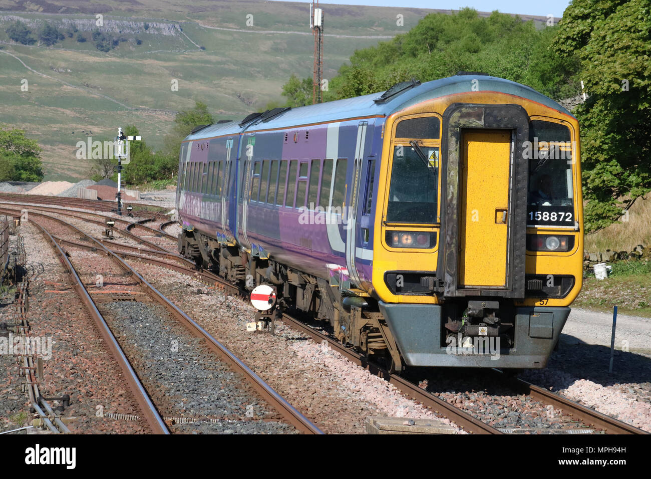 Class 158 Express Sprinter dmu with a passenger train on the Settle to ...