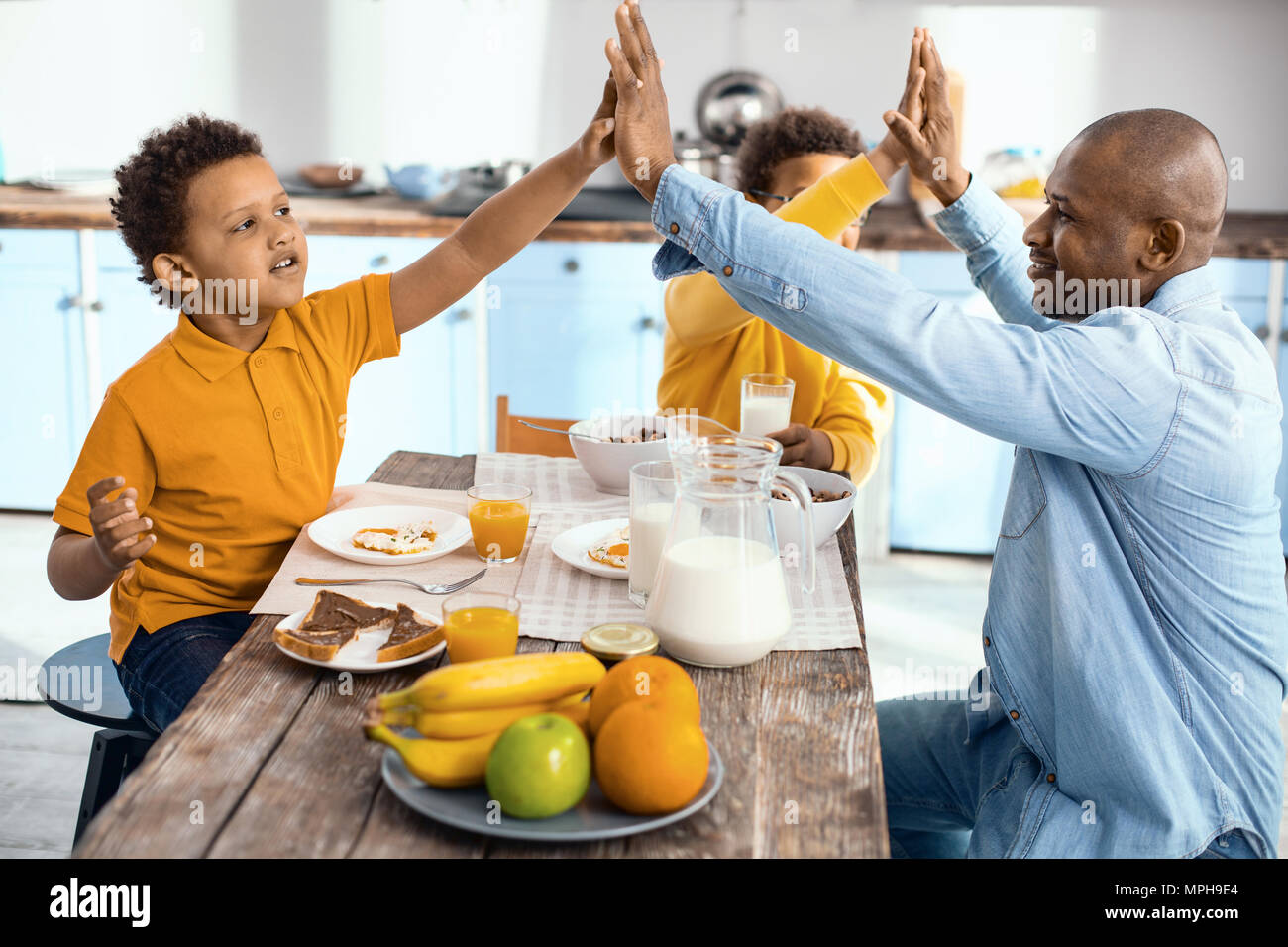 Kids Team High Five High Resolution Stock Photography and Images - Alamy