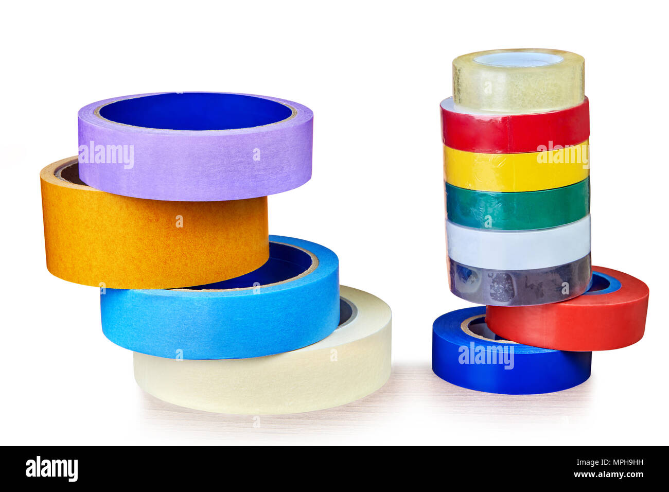 Two stacks of rolls of multi-colored adhesive tape, isolated on white ...