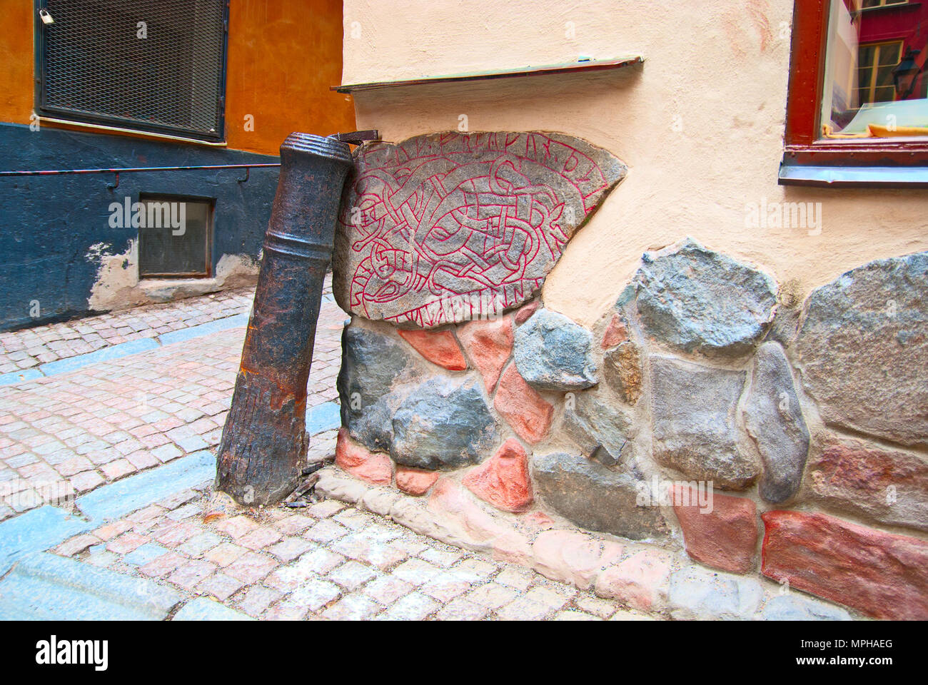 STOCKHOLM, SWEDEN - APRIL 11, 2010: Runestone in Gamla Stan. This runes ...