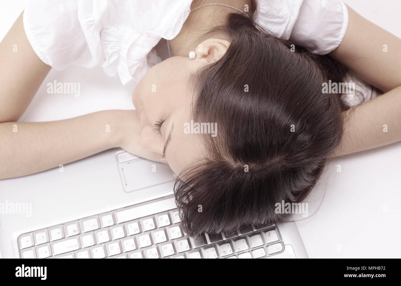 Woman sleeping on keyboard laptop hi-res stock photography and images ...