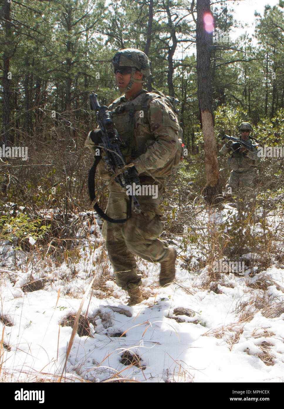 A Soldier assigned to 101st Airborne Division (Air Assault) patrols ...