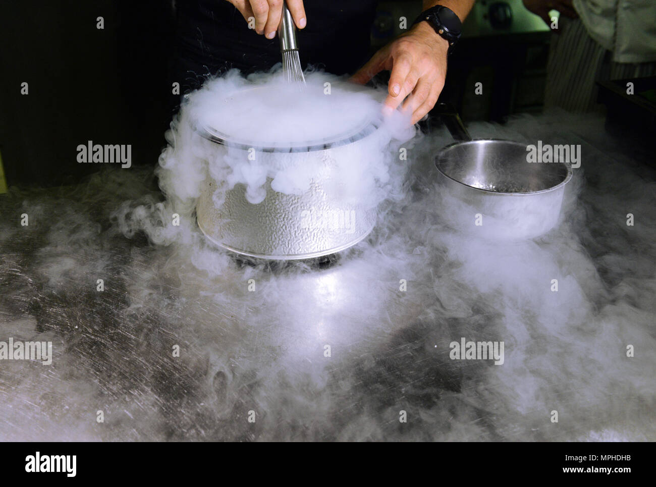 Making ice cream with liquid nitrogen, professional cooking Stock Photo ...
