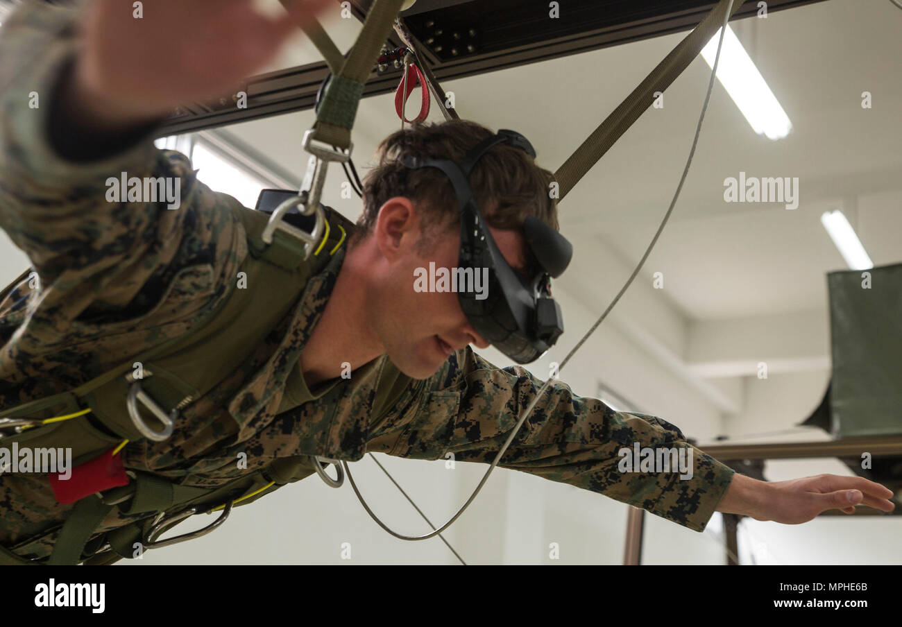 Cpl. Alex Thill endures the canopy flight simulator alongside Republic ...