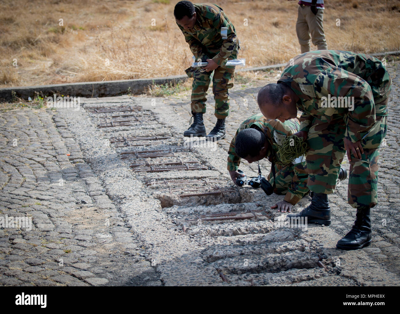 U.S. Navy Explosive Ordnance Disposal Sailors, train members of the ...