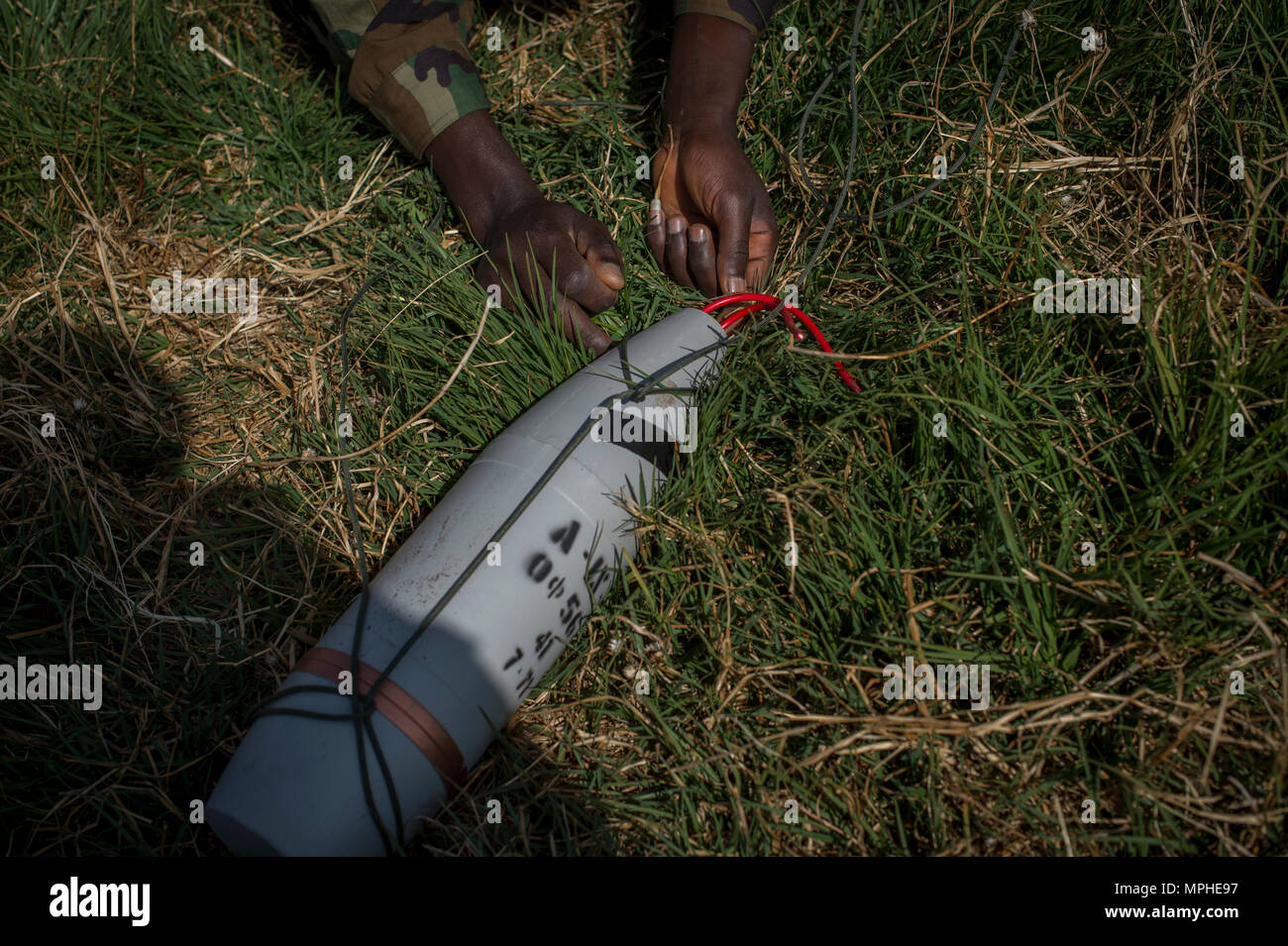 U.S. Navy Explosive Ordnance Disposal Sailors, train members of the ...
