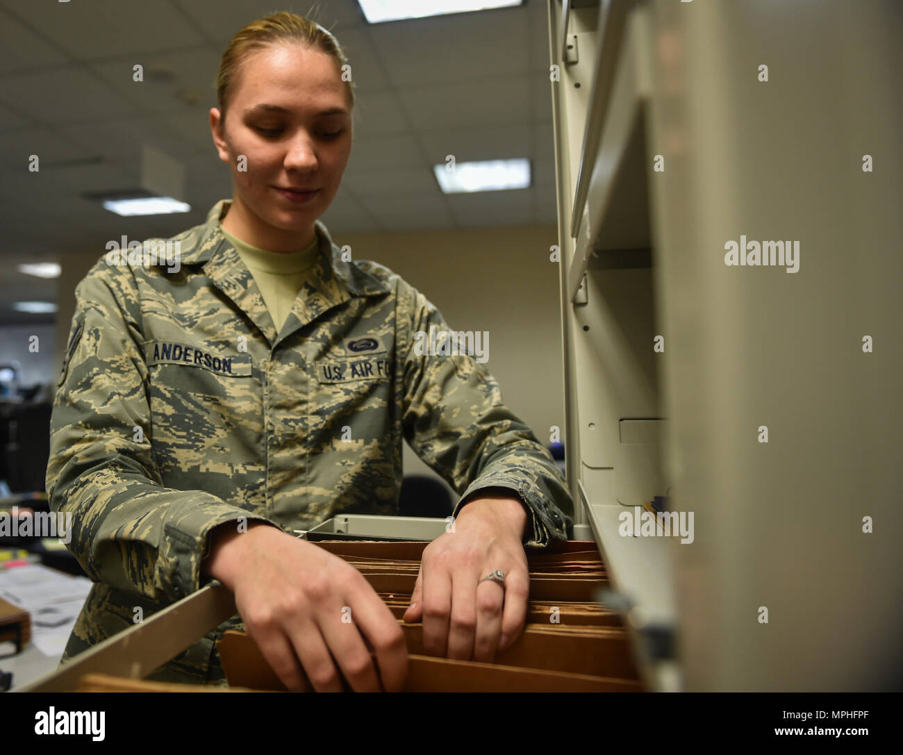 Airman 1st Class Briana Anderson, a re-enlistment and extension ...