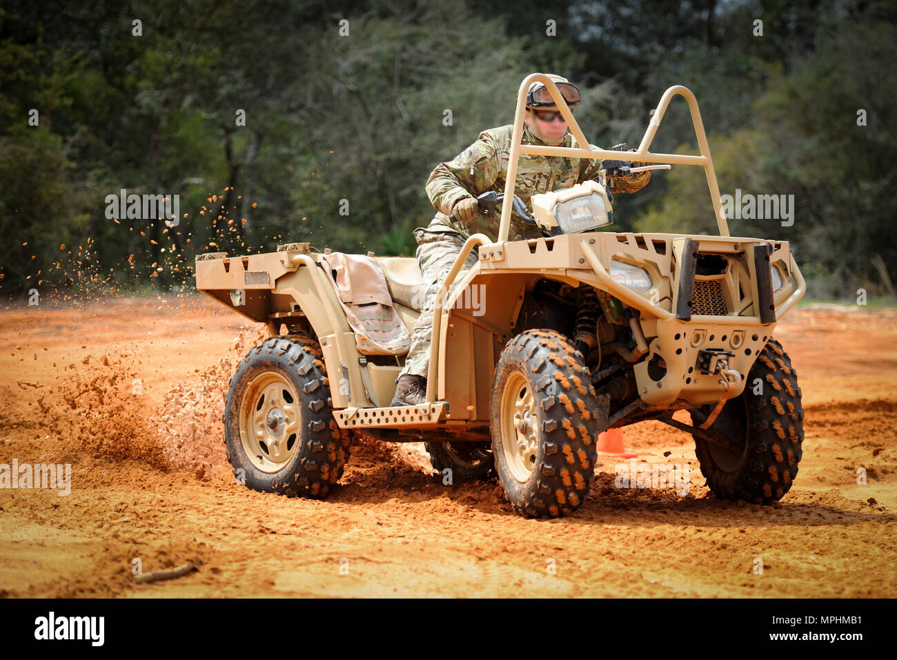 A Soldier with the 1st Battalion, 10th Special Forces Group, executes a ...
