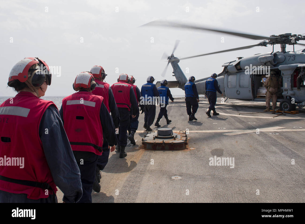 170306-N-HB733-038 ARABIAN GULF (March 6, 2017) Sailors aboard the ...