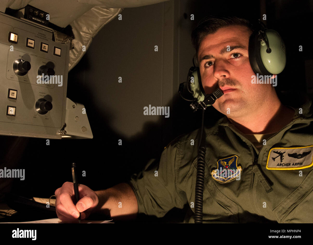 Capt. Kevin Arpin, 69th Bomb Squadron instructor pilot, inspects the ...