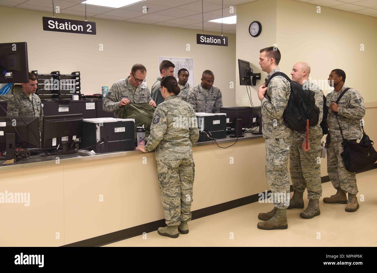 Members of Team McConnell practice processing Airmen through pre ...