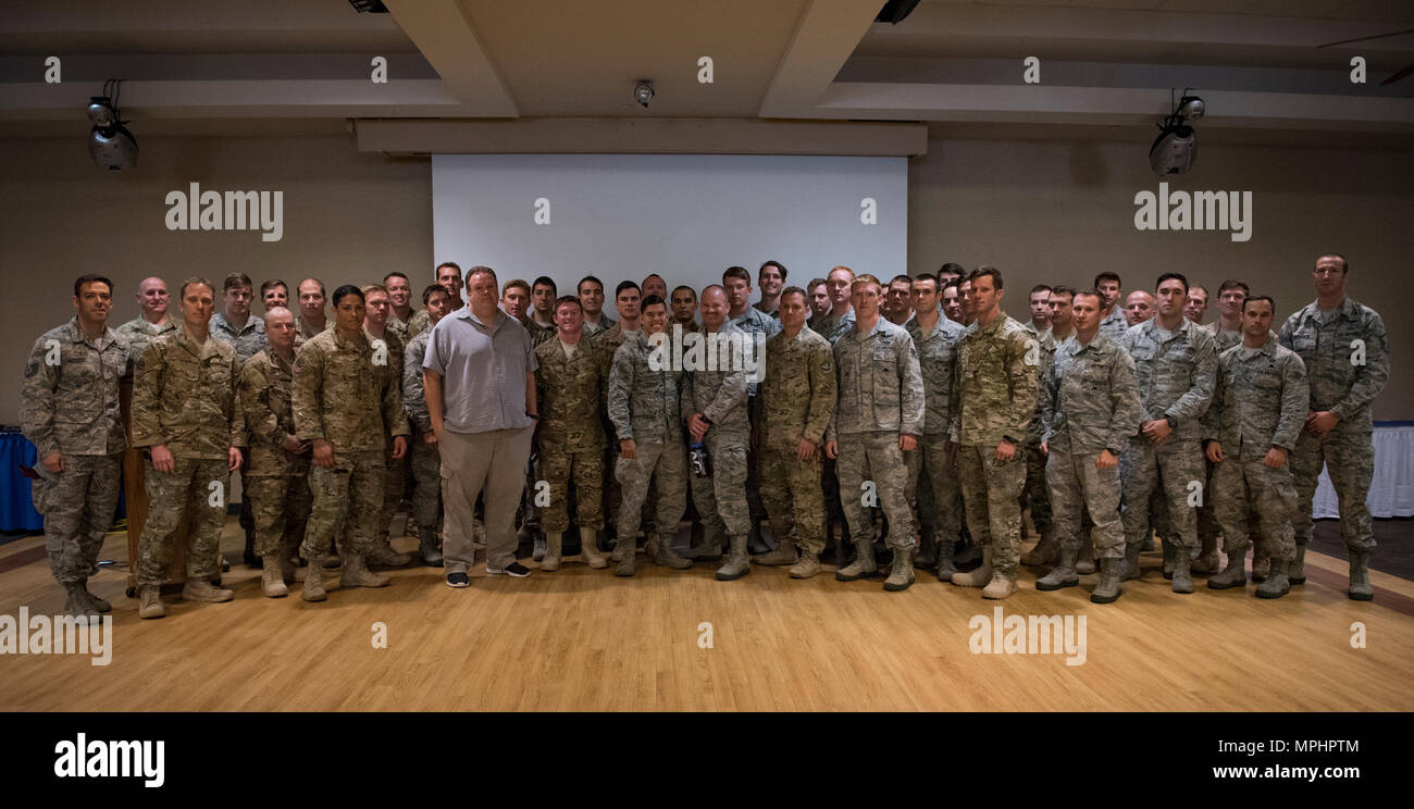 Airmen from the 38th Rescue Squadron pose for a photo with Retired Tech ...