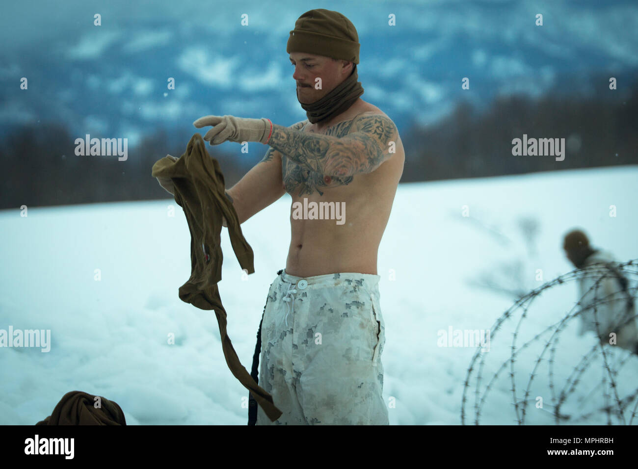 U.S. Marine Staff Sgt. Brett Tate, a San Clemente, California native ...