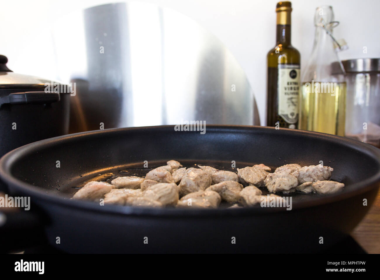 Making food in a kitchen Stock Photo - Alamy