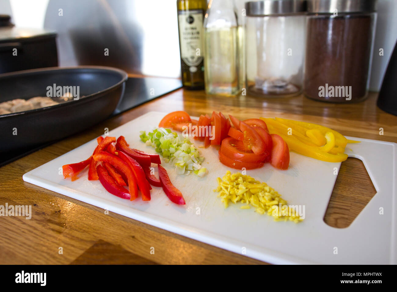 Making food in a kitchen Stock Photo - Alamy