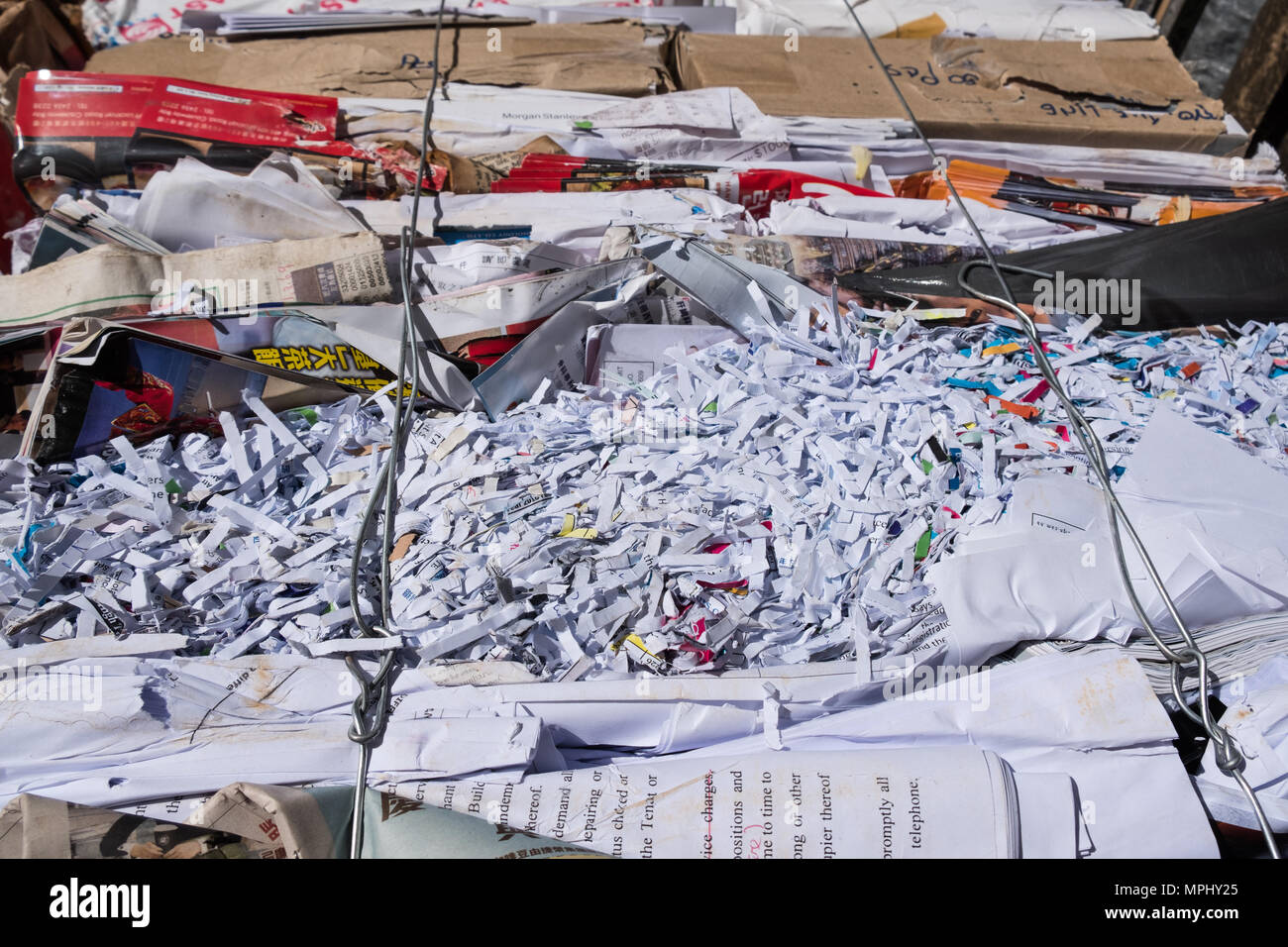 Office waste paper, old newspapers, cardboard packed for recycling ...