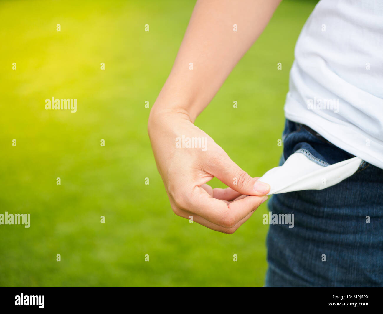 Woman with empty pockets hi-res stock photography and images - Alamy