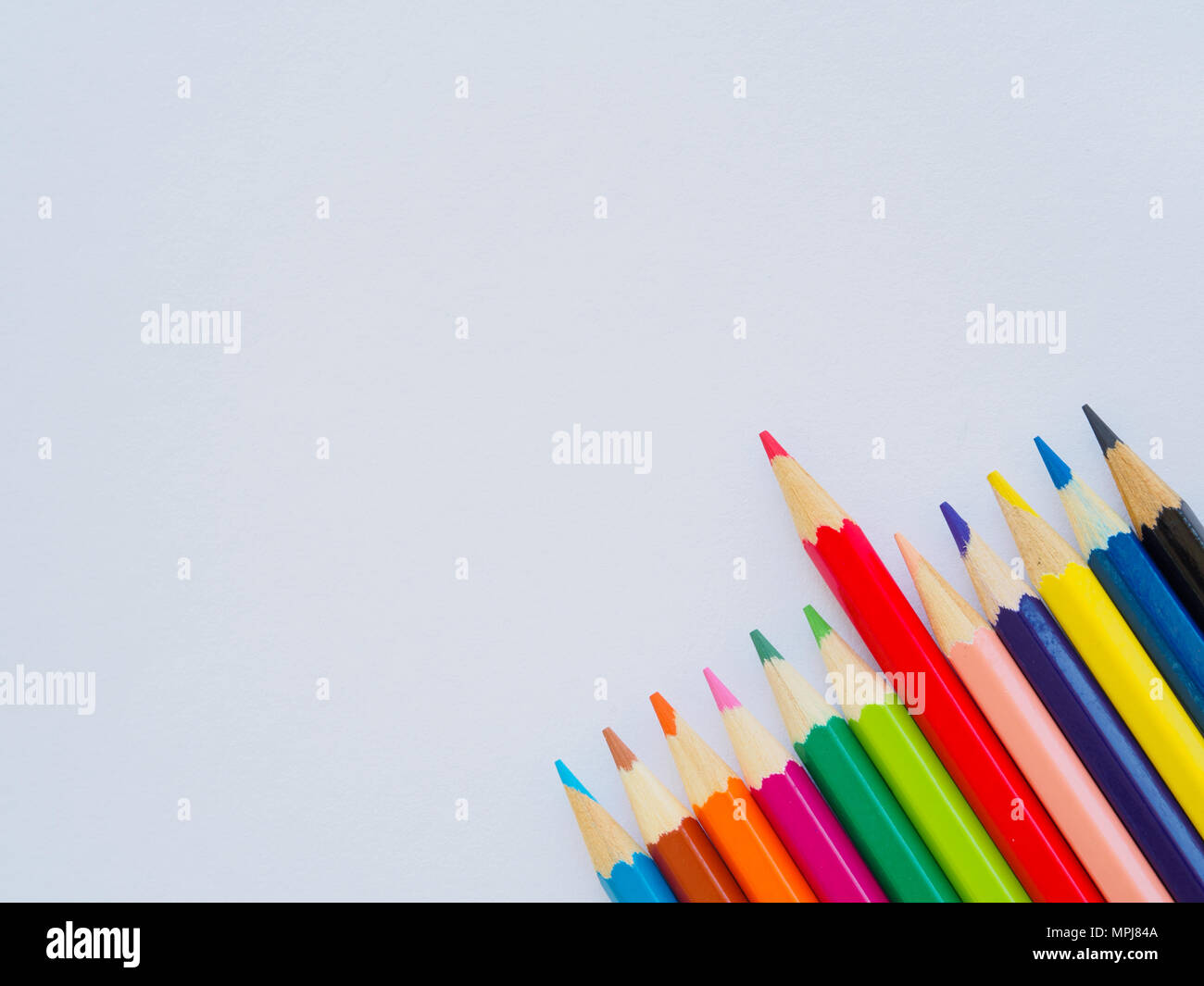 Color pencils on white paper. Education material back to school, for ...