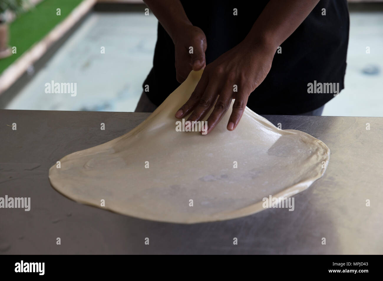 Home made Roti Canai in Kuala Lumpur, Malaysia Stock Photo - Alamy
