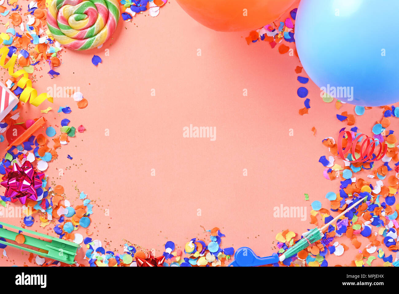 Top view of colorful party confetti background with place for text ...