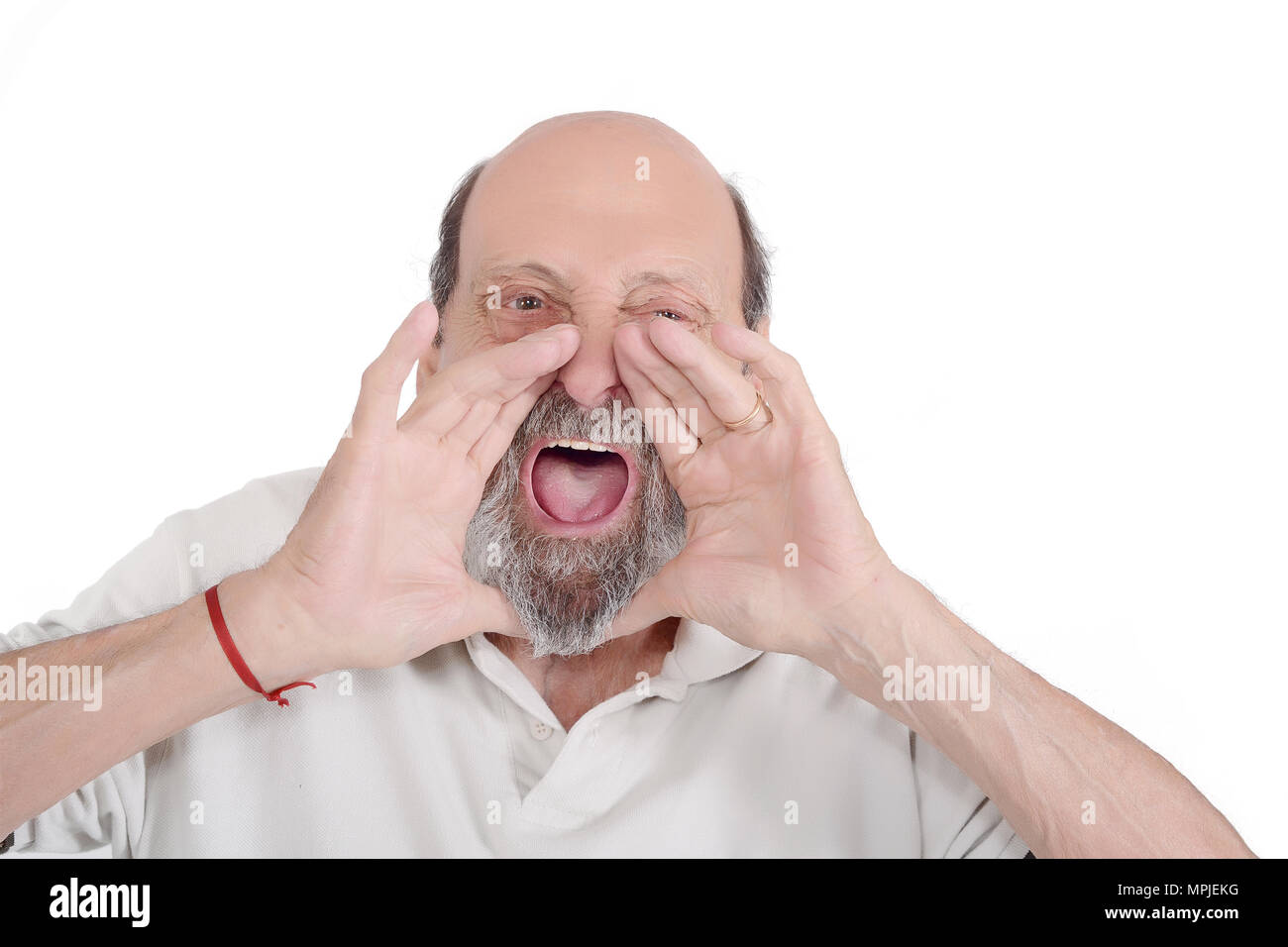 Portrait of elderly man screaming with her hands on face. Isolated ...