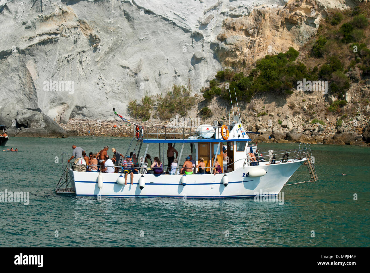 Guided boat tour around Ponza Island, Lazio, Italy Stock Photo - Alamy