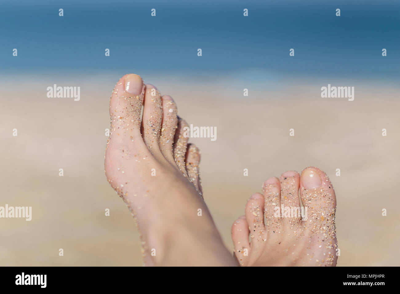 Crossed toes hi-res stock photography and images - Alamy