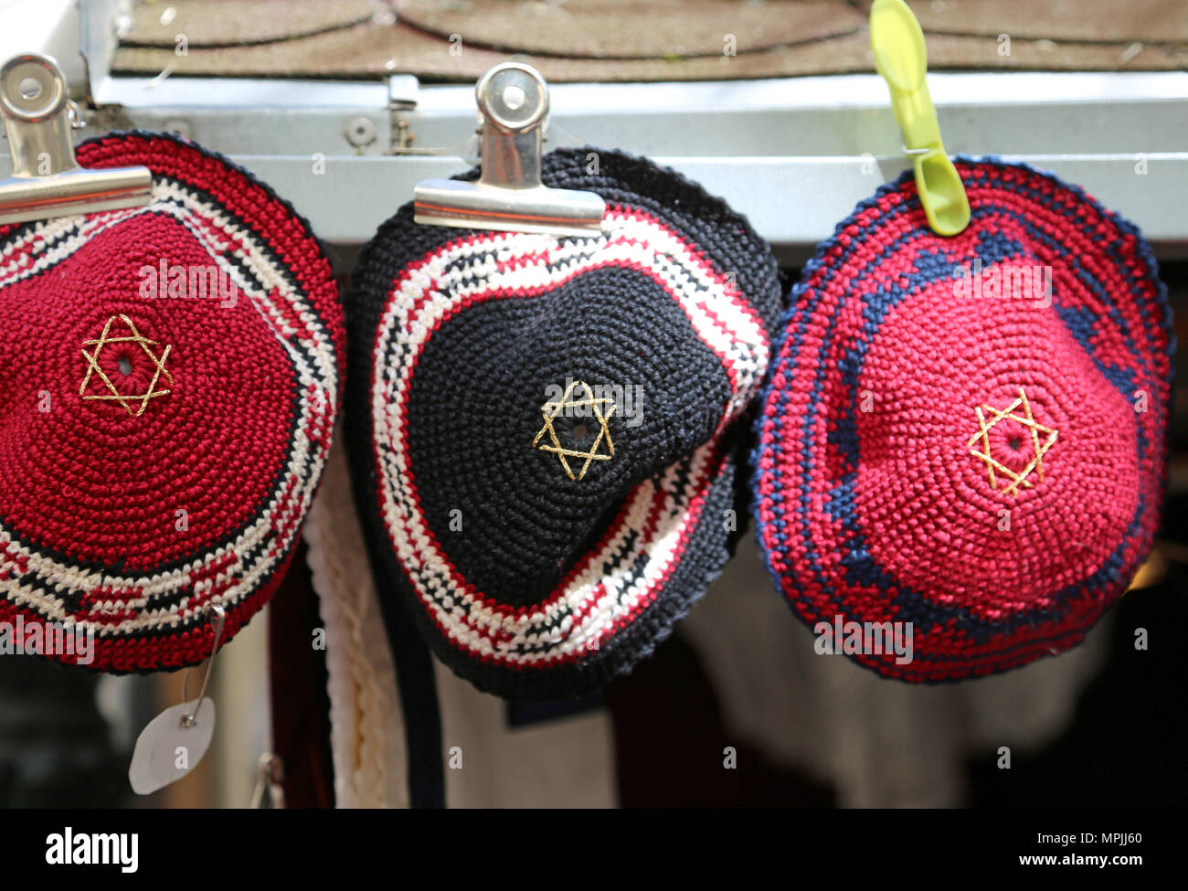 Three Jewish religious headgear called kippahs or yarmulkes with star ...