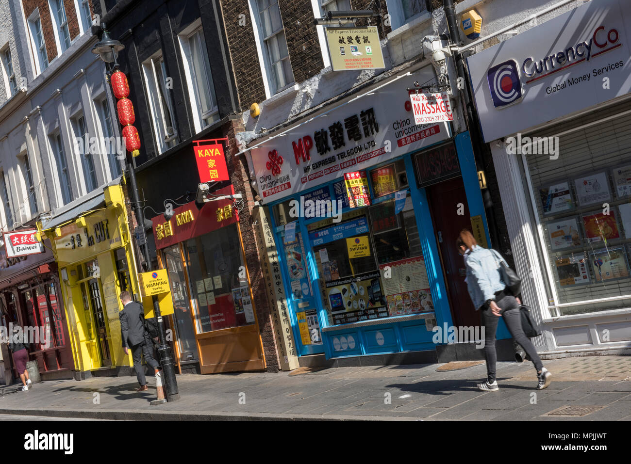 shops in a row in china town, leicester square in central london ...