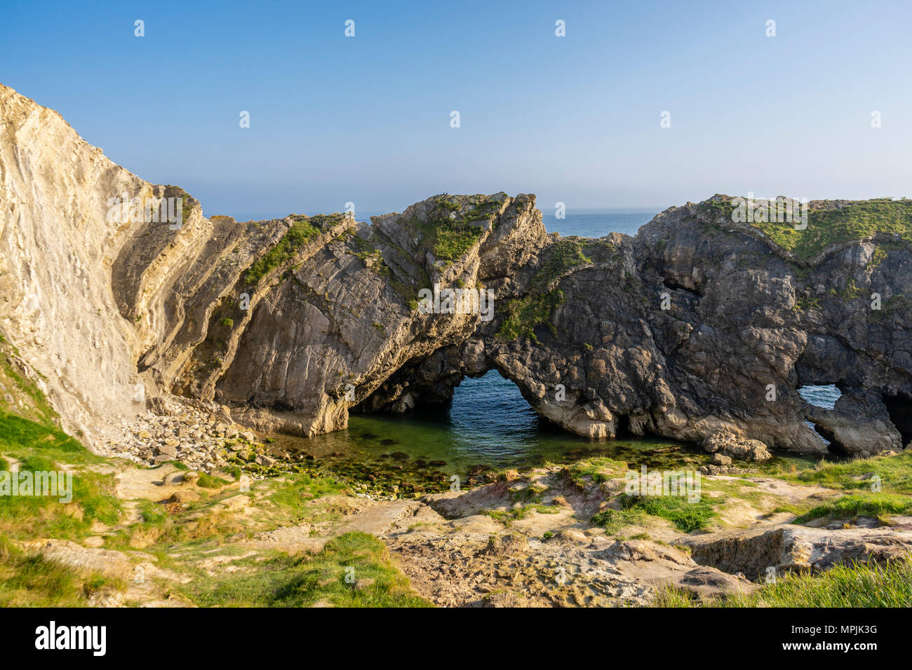 The Stair hole, layers of sedimentary rock along the Jurassic Coast in ...