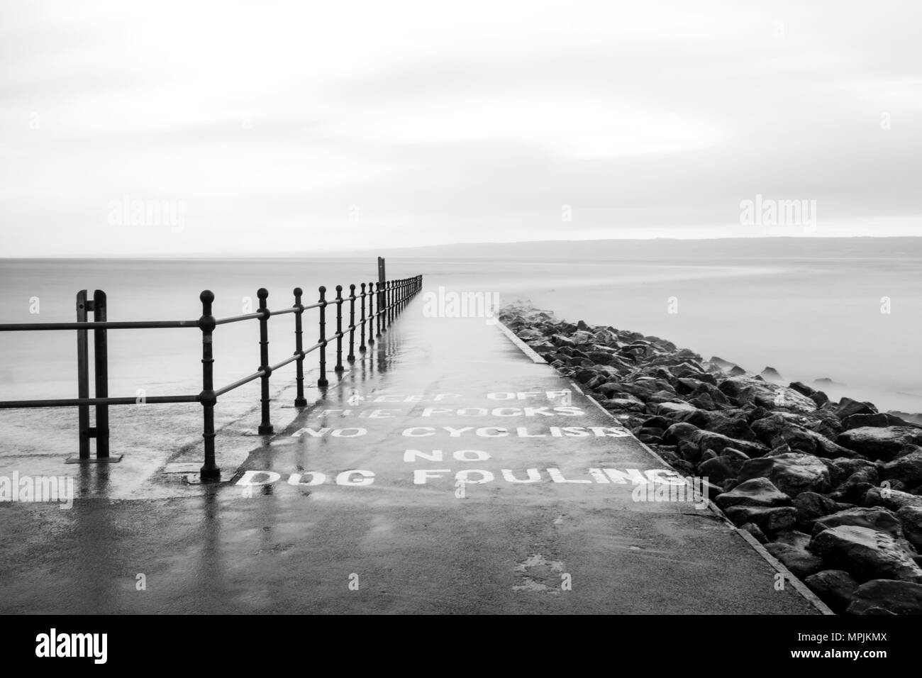 Marine lake pathway into the stormy sea Stock Photo - Alamy