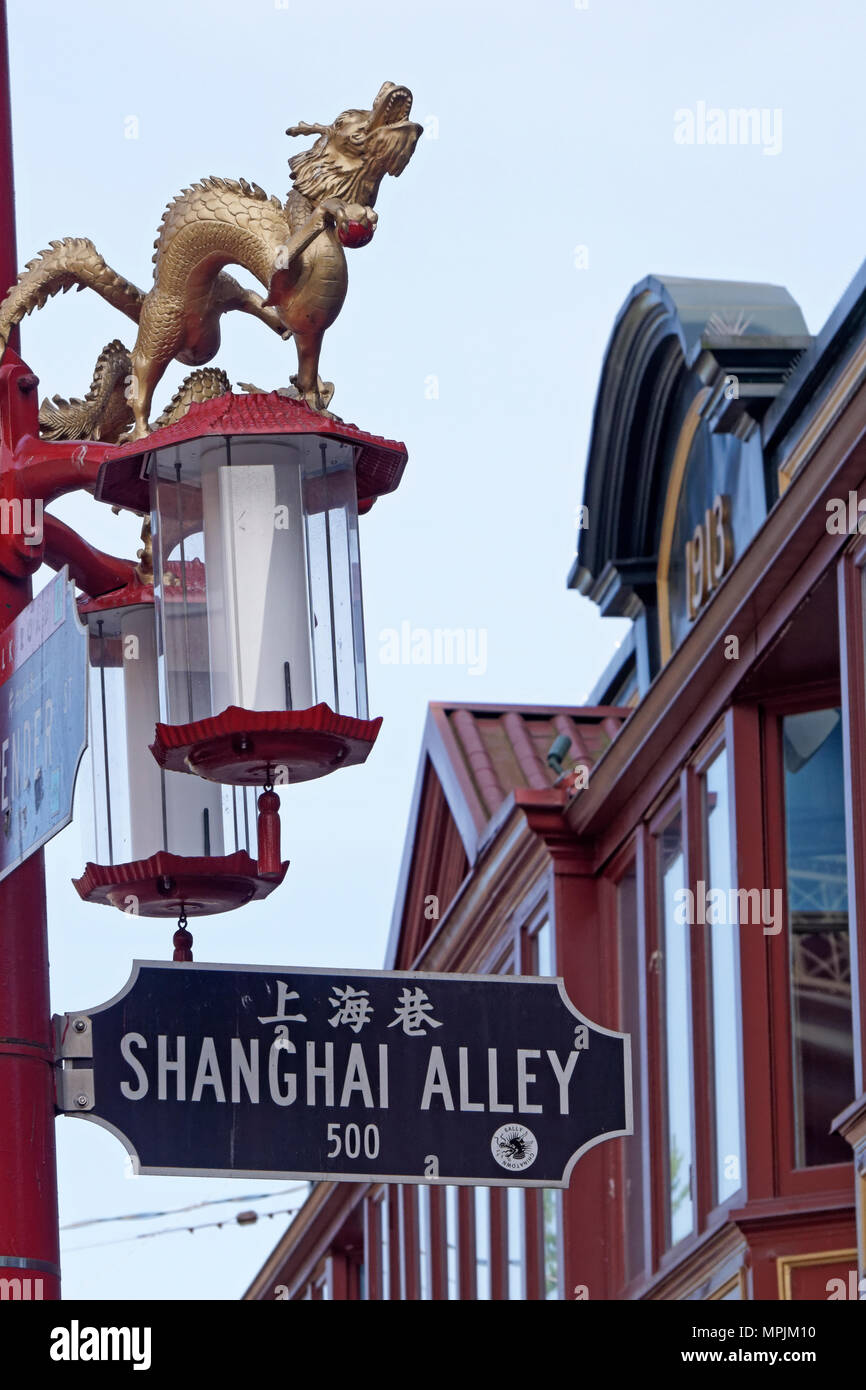Shanghai Alley street sign with and ornate Chinese streetlights ...