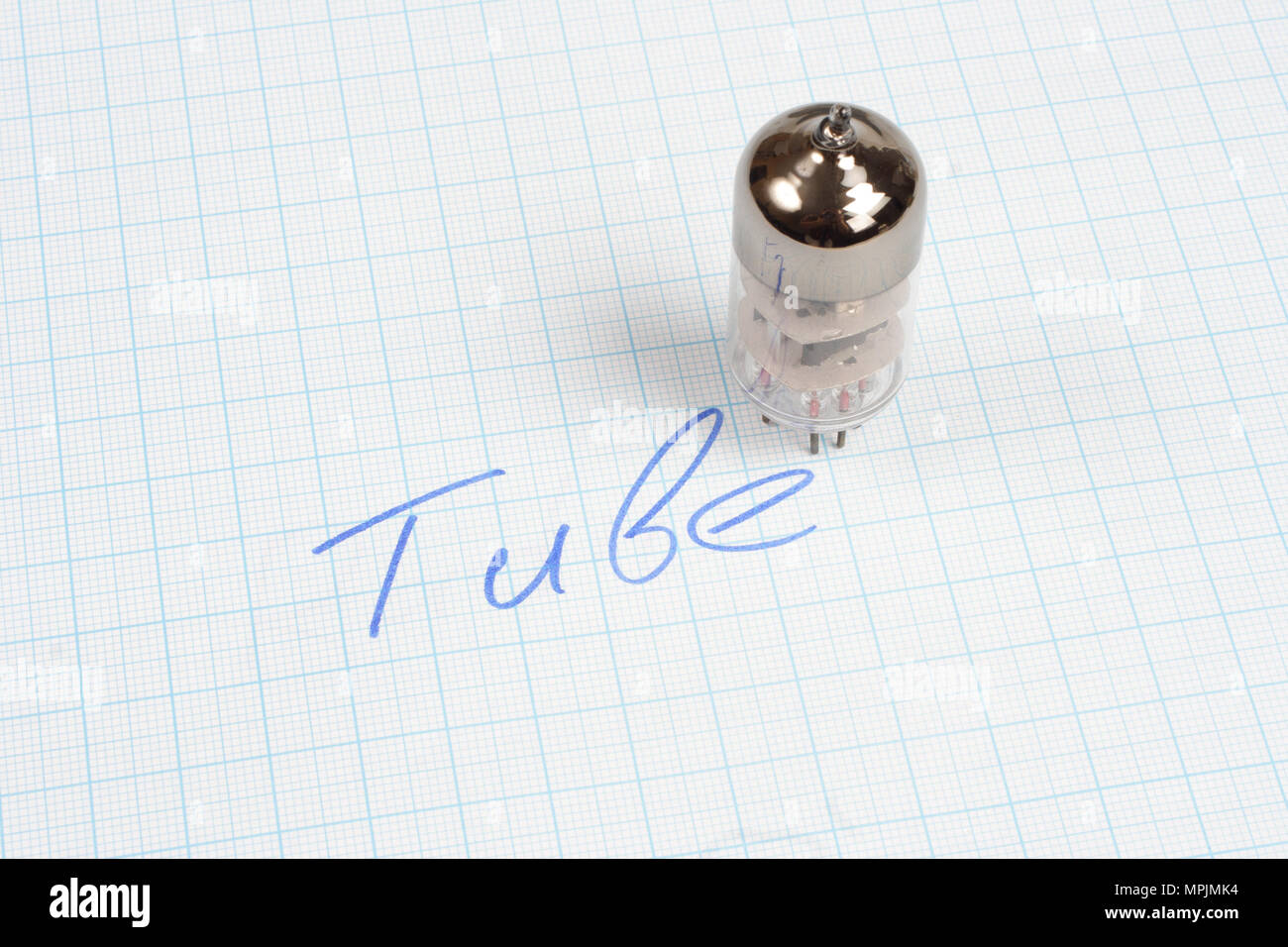 old vacuum tube (electron tube) on graph paper background Stock Photo ...