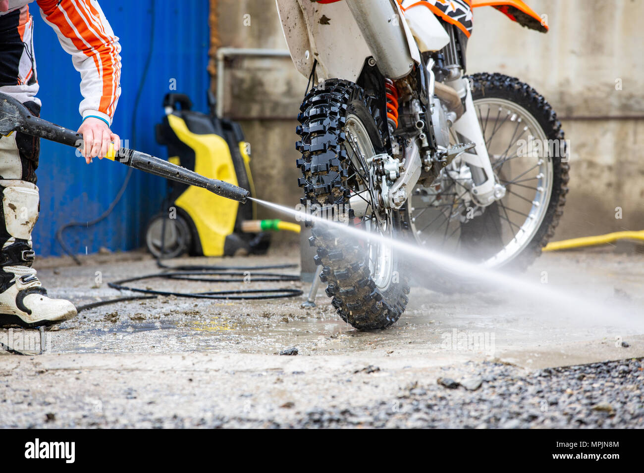 biker washes a motorcycle Stock Photo - Alamy