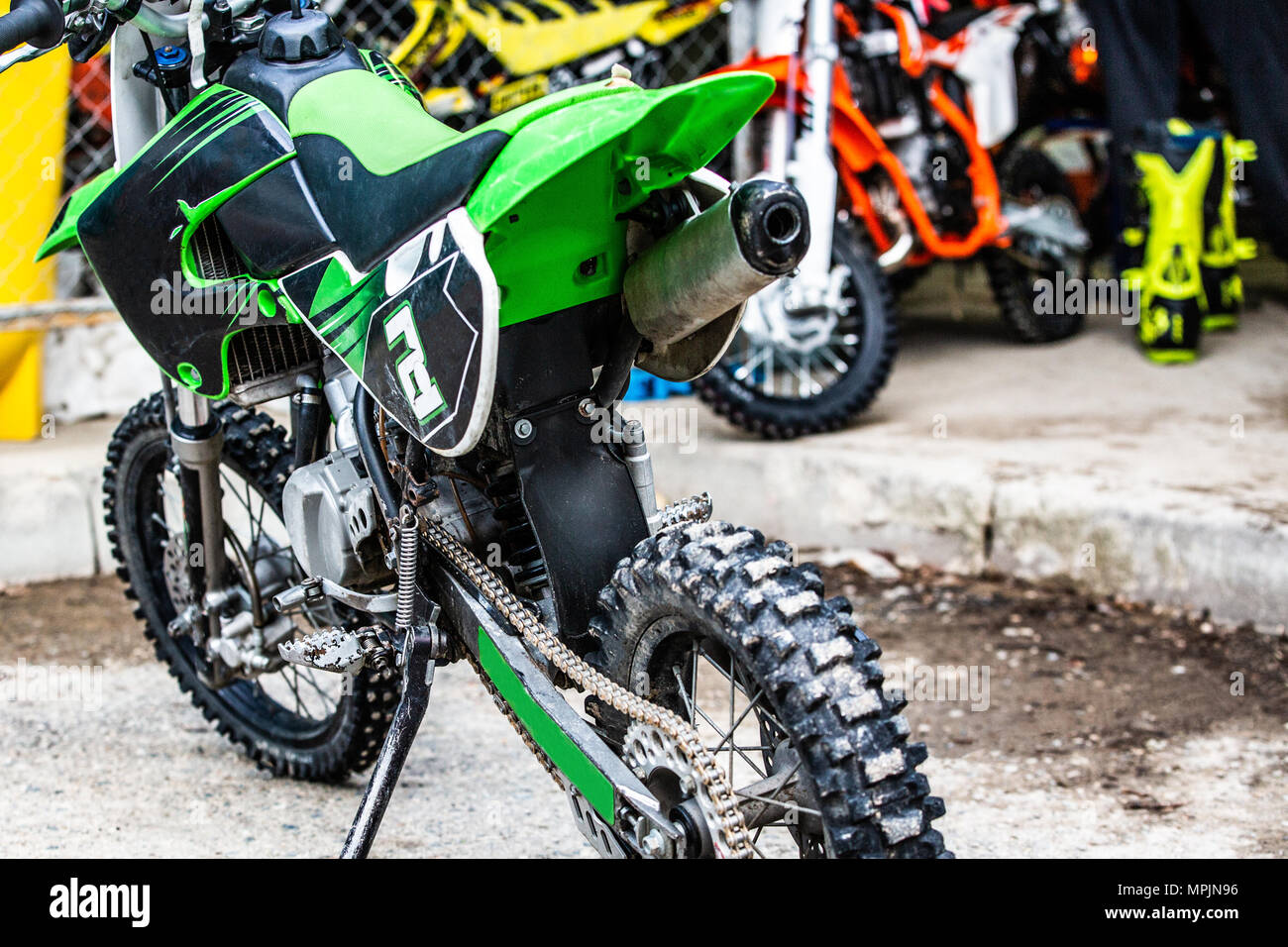 Motorcycle for extreme racing on parked Close up of wheel Stock Photo ...