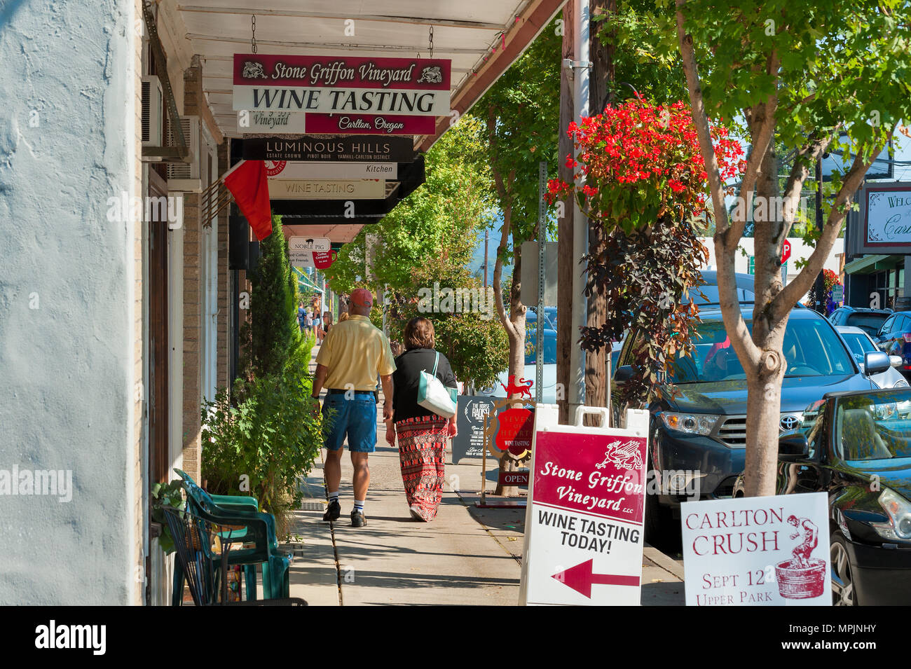Carlton, Oregon,USA - September 12, 2015:People walk the sidewalk in ...