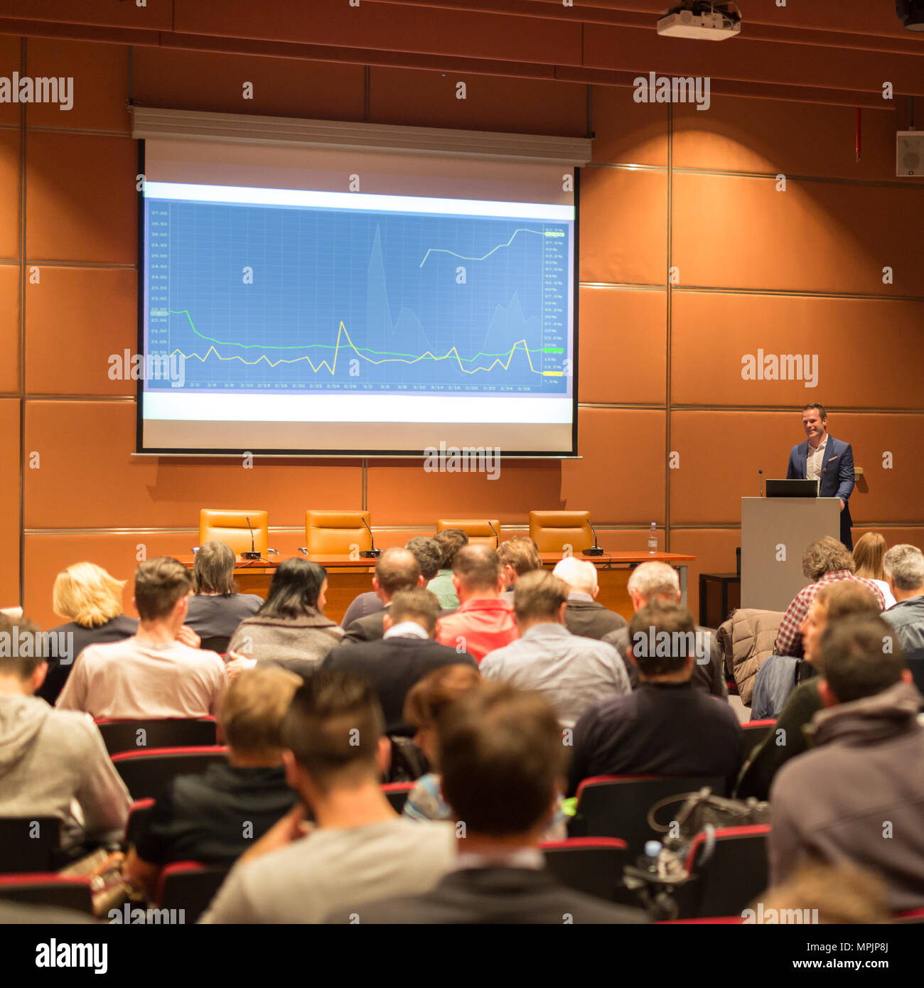 Business speaker giving a talk at business conference event Stock Photo ...