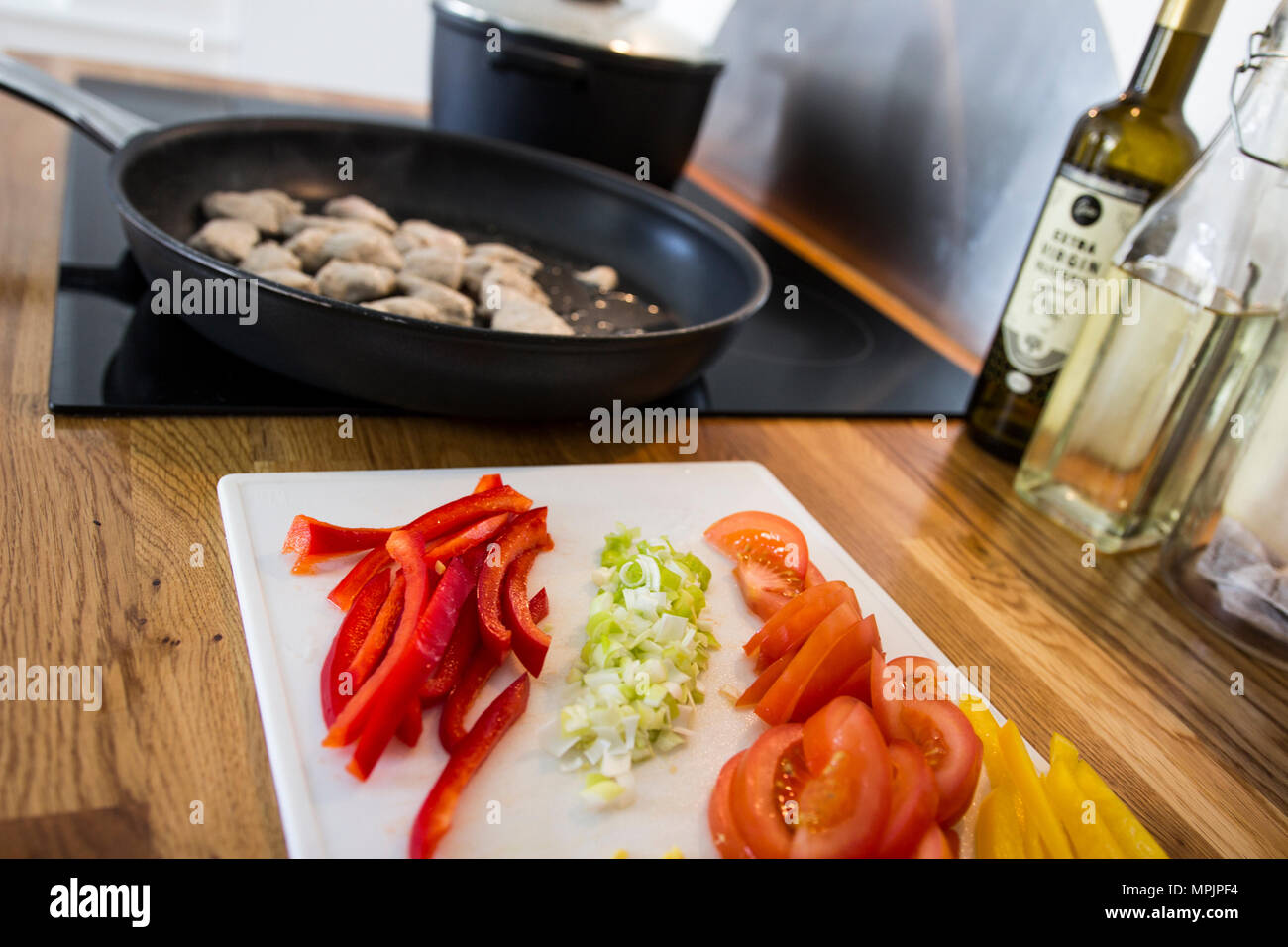 Making food in a kitchen Stock Photo - Alamy