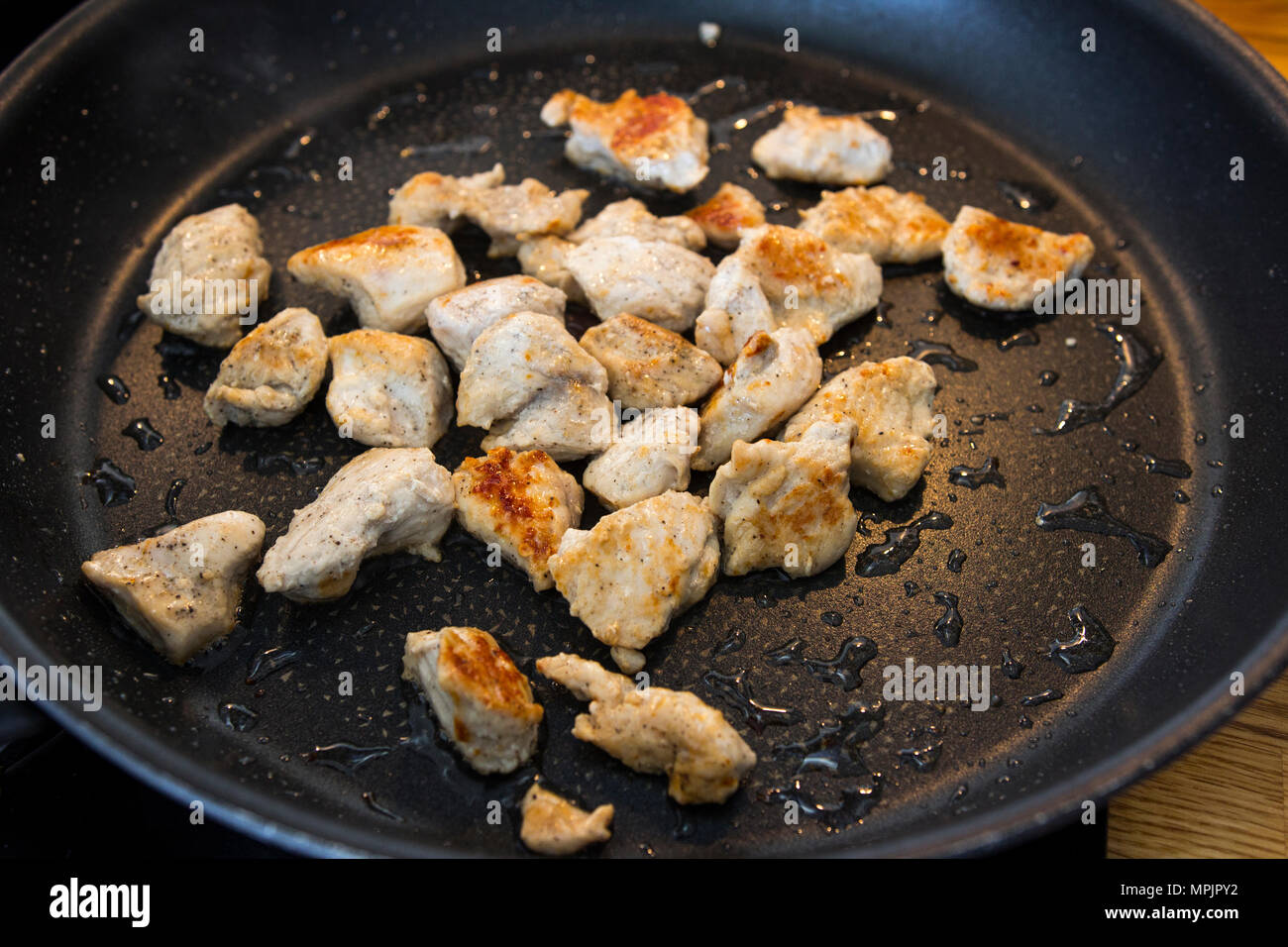 Making food in a kitchen Stock Photo - Alamy