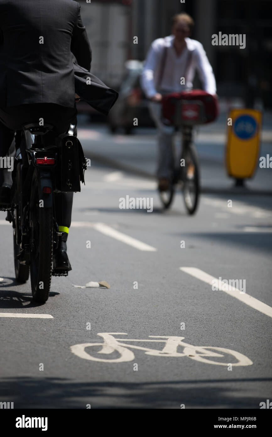 Cyclists use a designated cycle lane near Bank, London Stock Photo - Alamy