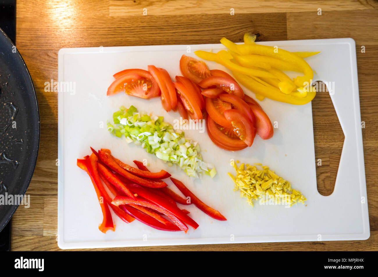 Making food in a kitchen Stock Photo - Alamy