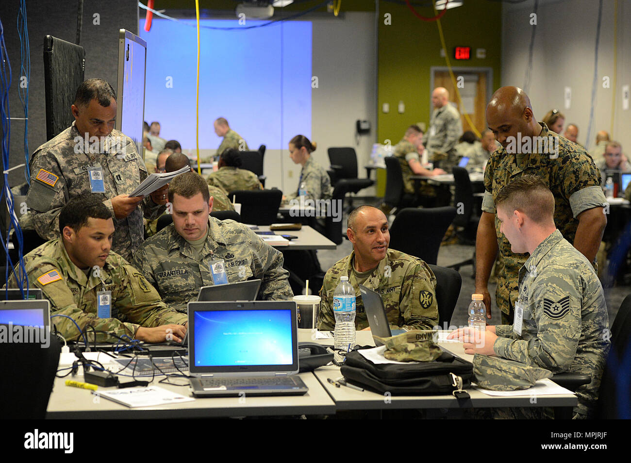 Trainers and trainees go over lessons learned at the Joint Requiring ...