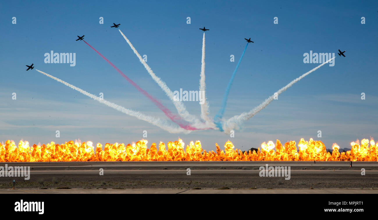 The Patriot Jet Team breaks out of formation over a "Wall Of Fire" as ...