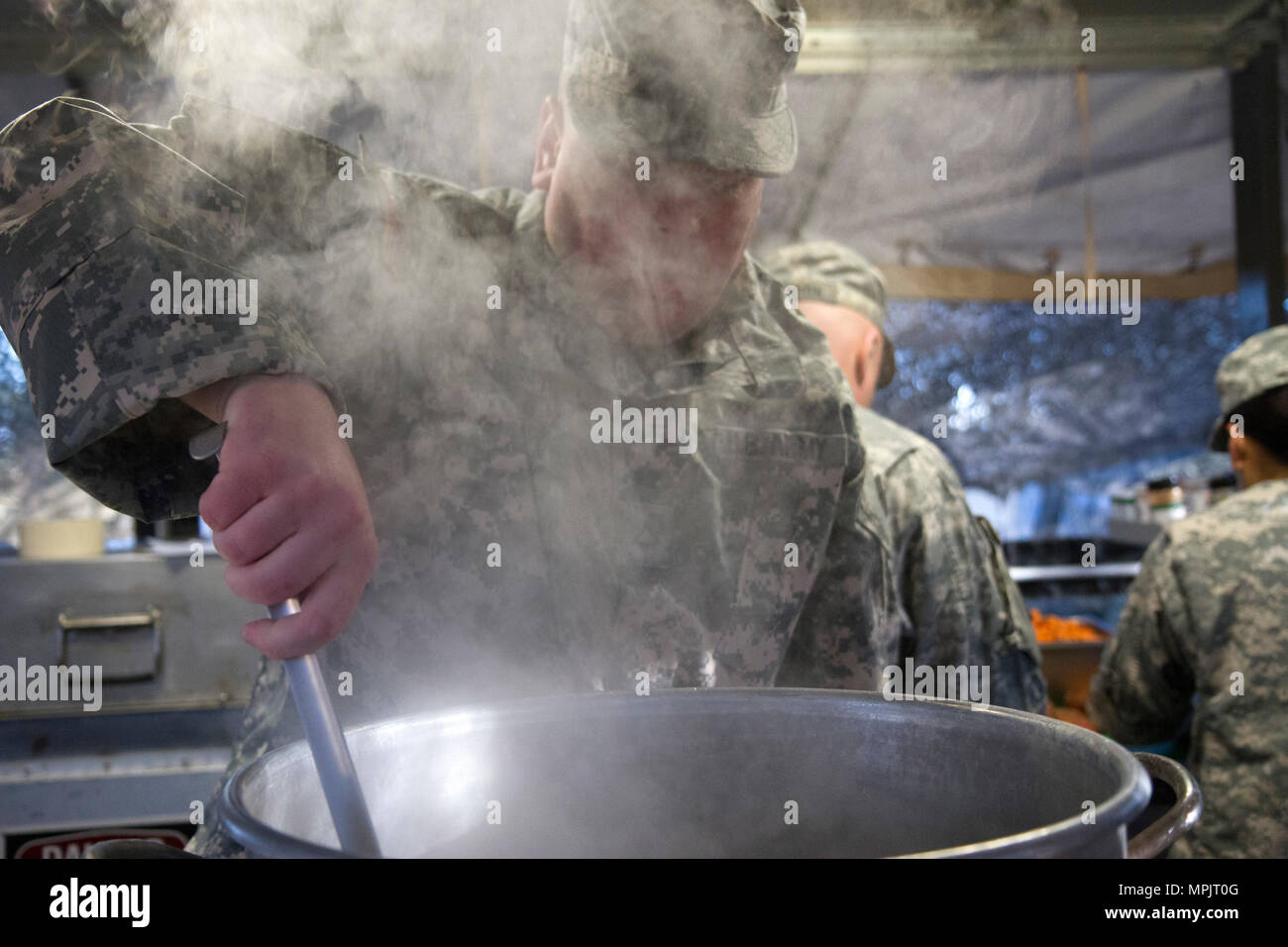 Pfc. Jordan Myers, a culinary specialist from the culinary team of the ...