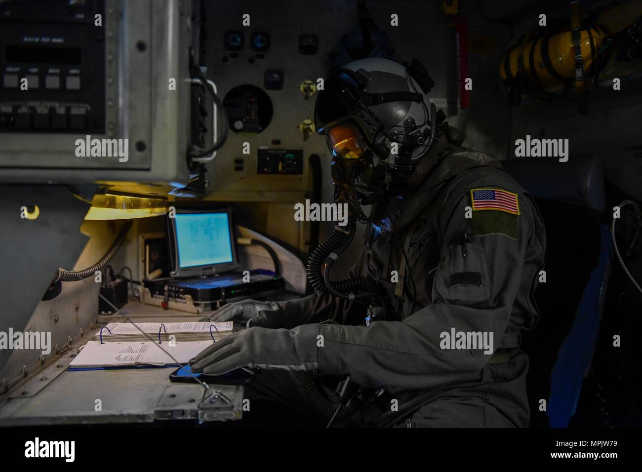 Senior Airman Grant Smart, 15th Airlift Squadron loadmaster, performs ...