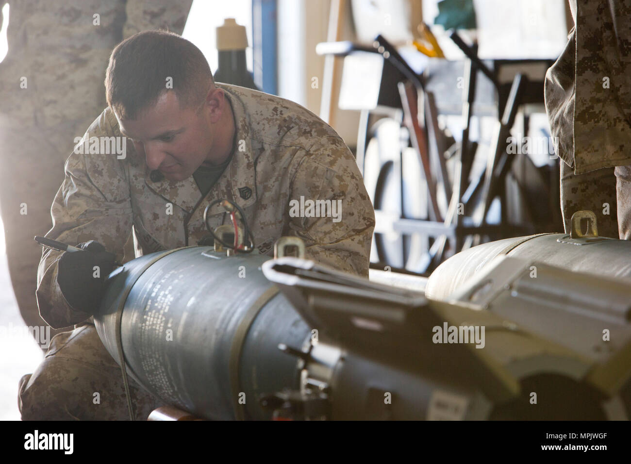 U.S. Marine Corps Staff Sgt. Jeffrey W. Stiles, an aviation ordnance ...