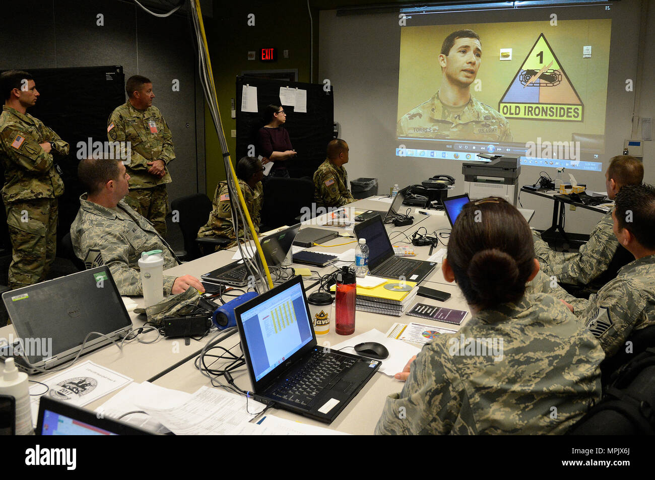 Members of Senior Contracting Official Cell reviews their on-camera ...