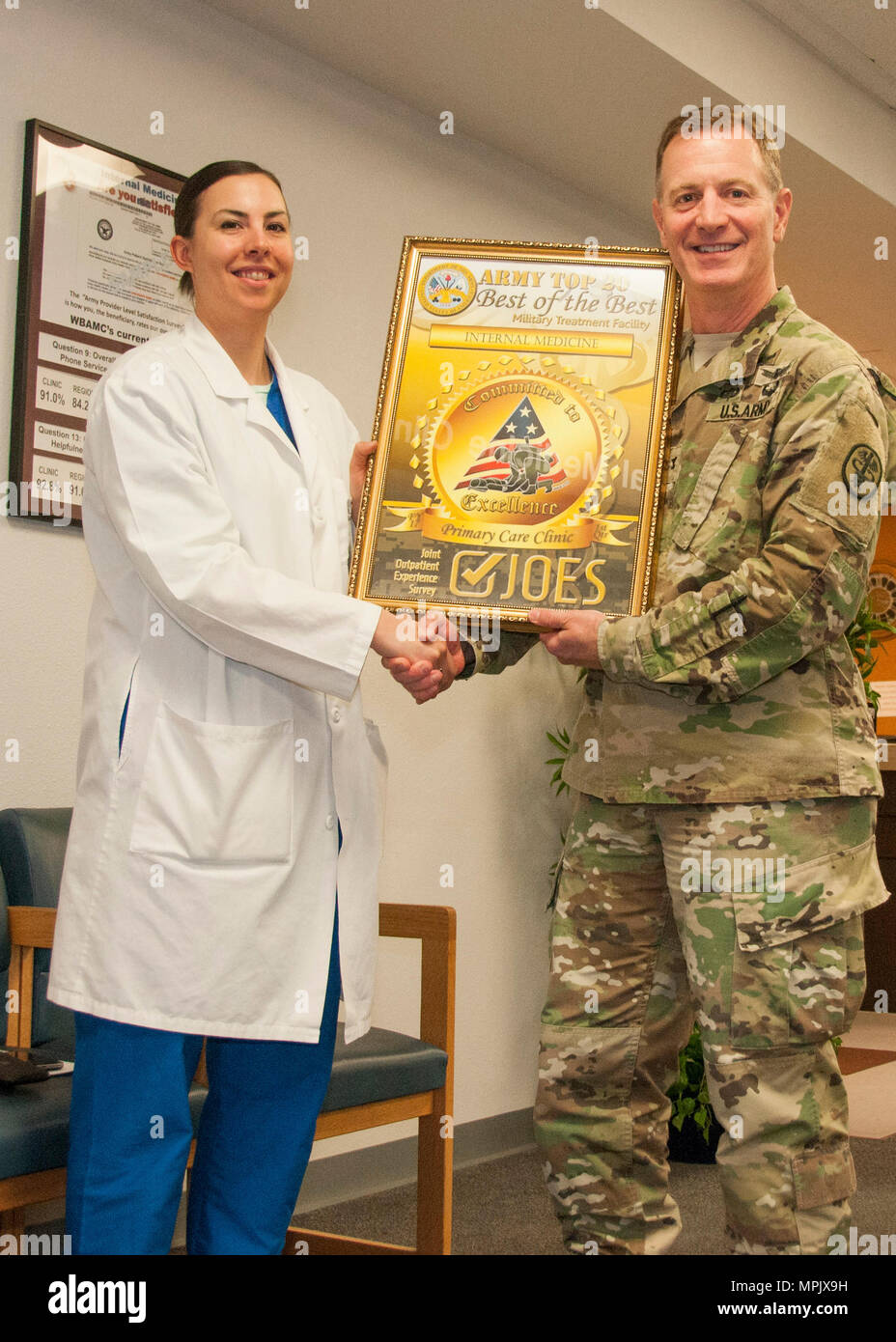 Col. John A. Smyrski III (right), commander, William Beaumont Army ...