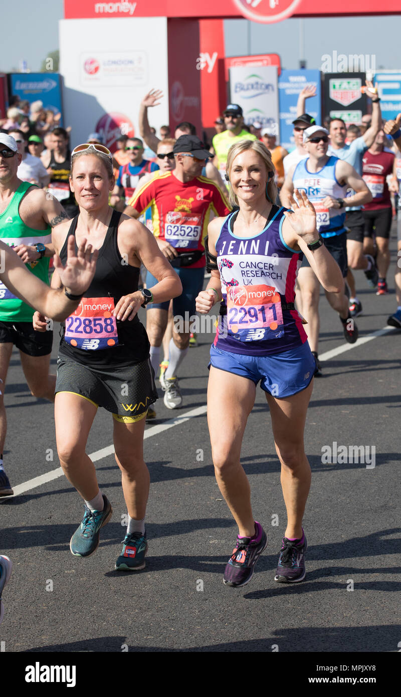 Runners pose for as they participate in The Virgin London Marathon ...